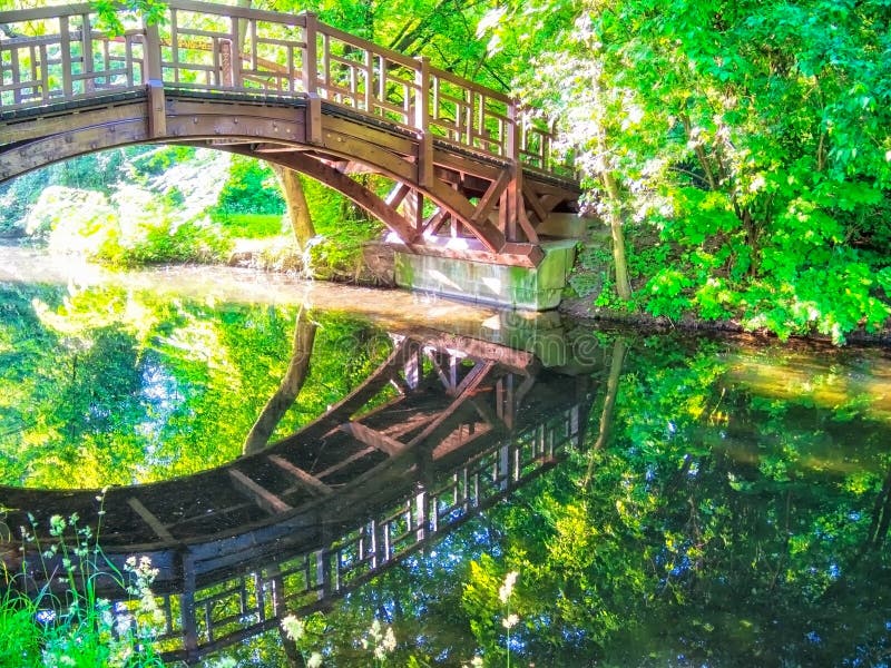 Arch Bridge Made of Wood in the Johannapark in Leipzig Stock Image ...