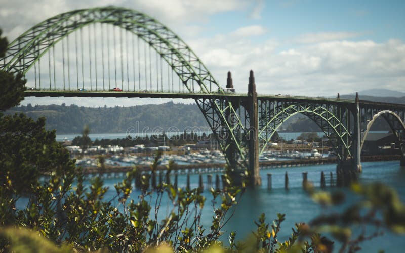 Arch Bridge Over River stock photo. Image of boats, nature - 91634352