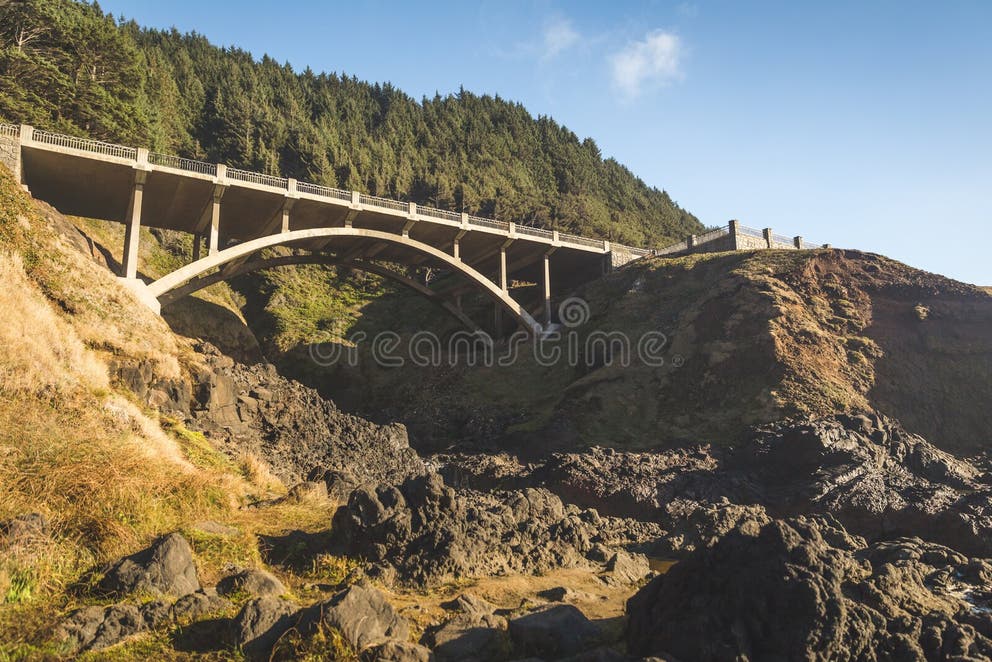 Arch Bridge Over Rocky Ravine Stock Photo - Image of ravine, woods ...