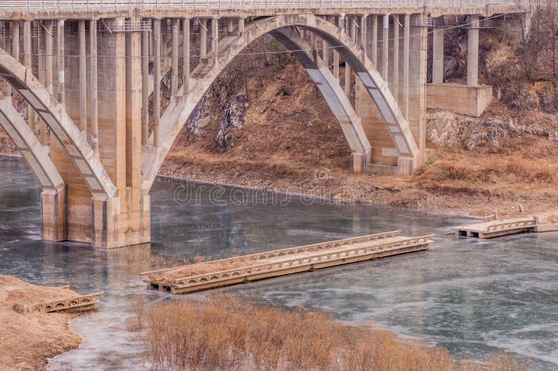 Arch Bridge with Spandrel Columns Spanning a River Stock Photo - Image ...