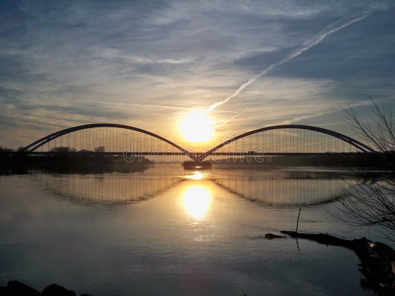 Arch bridge in sunset stock photo. Image of torun, steel - 52394492