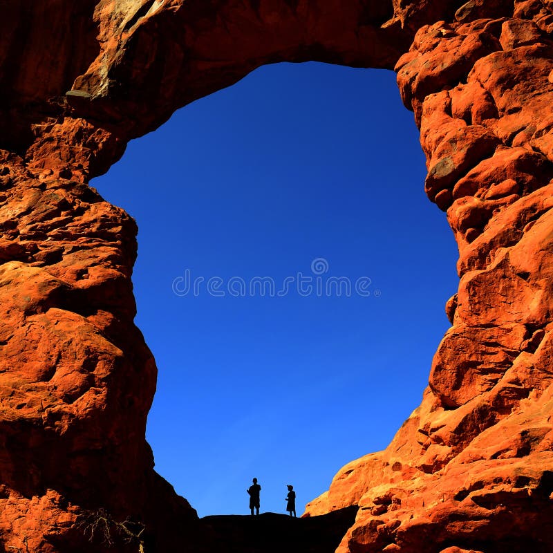 Arch in Canyon Rock Formations Silhouetter of Hiker Stock Photo - Image ...