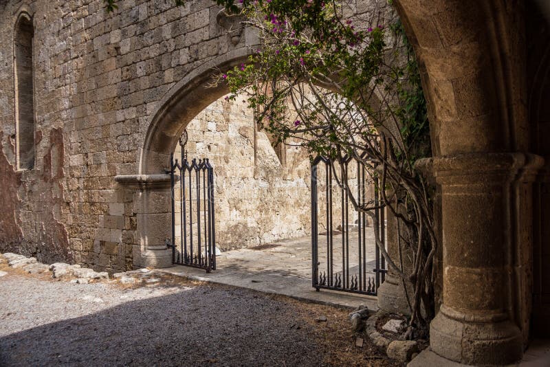 Arch with a Gate in the Wall of Stone in Greece Stock Image - Image of ...