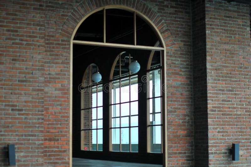 Arch in an Old Building with Windows in the Background Stock Photo ...
