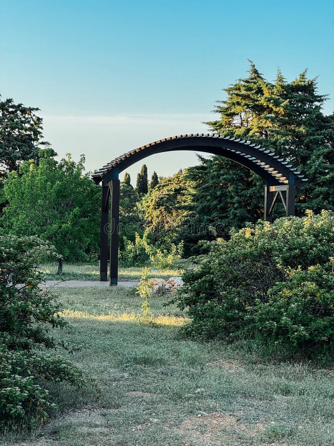 Arch in the Park among Trees Stock Image - Image of built, garden ...