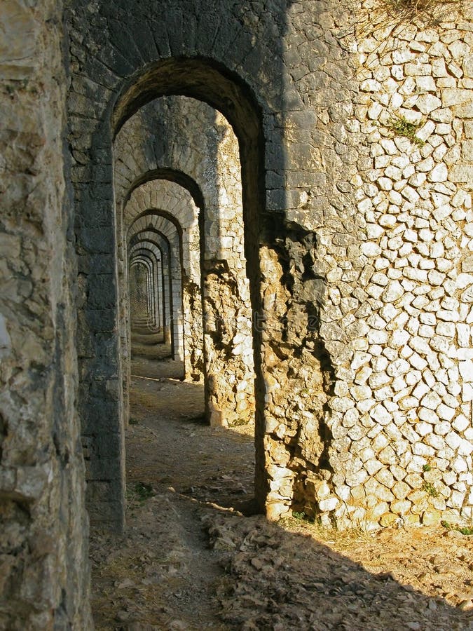 Arch pathway in old town stock photo. Image of historic - 16815596