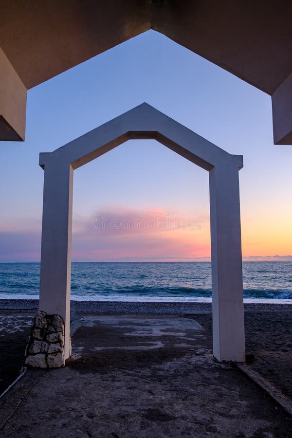 Arch on the Seashore at Sunset Time Stock Photo - Image of arch ...