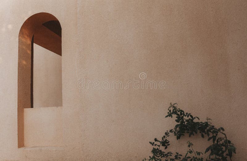 An Arch-shaped Window in the Wall of the Building. Light Shadows on the ...