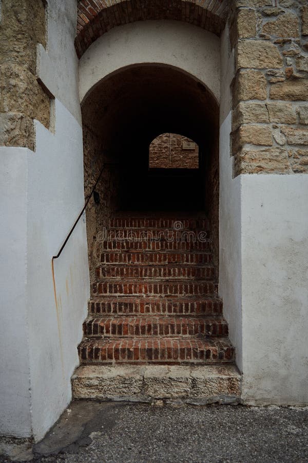 An Arch with Stairs in the Wall of a Stone House Stock Image - Image of ...