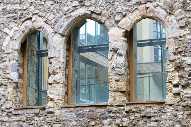 Arch windows stock photo. Image of three, arch, stones - 28032194
