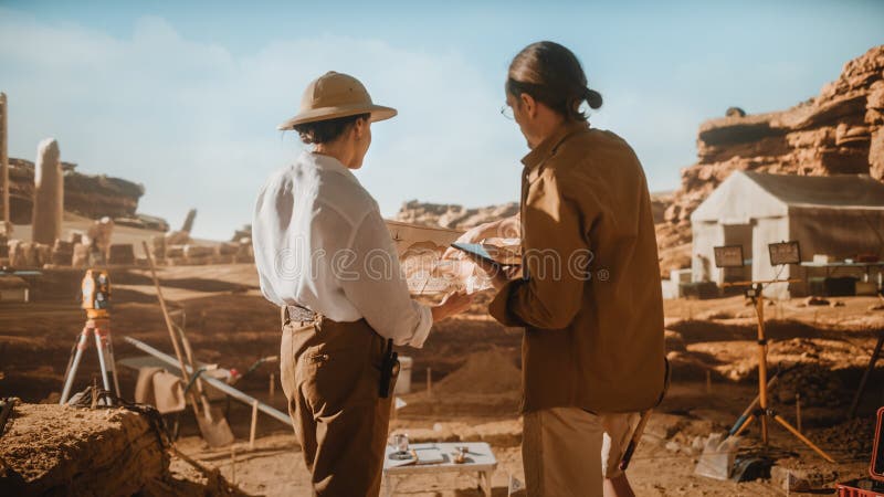 Archaeological Digging Site: Two Great Archeologists Work on Excavation ...
