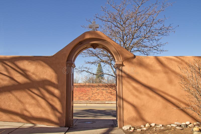Arched Adobe Gate with Wooden Door in California Stock Photo - Image of ...