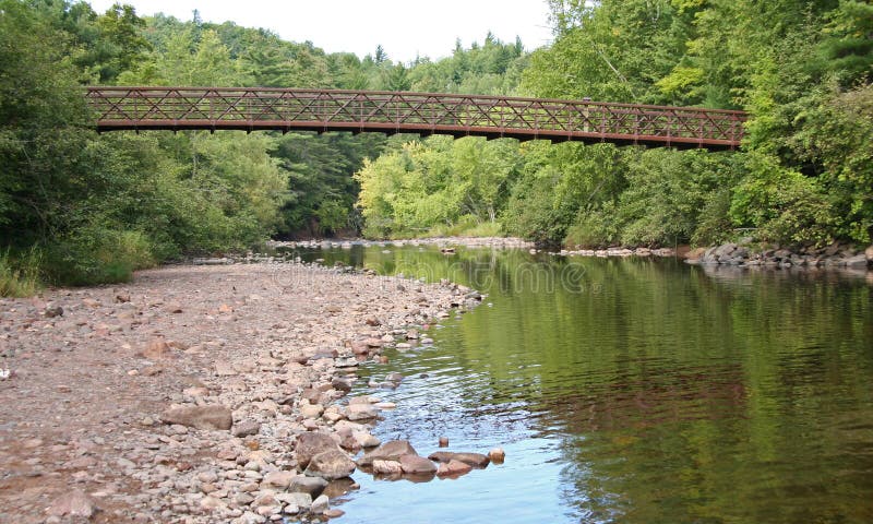 Arched Bridge Above Calm Stream Stock Image - Image of reflections ...