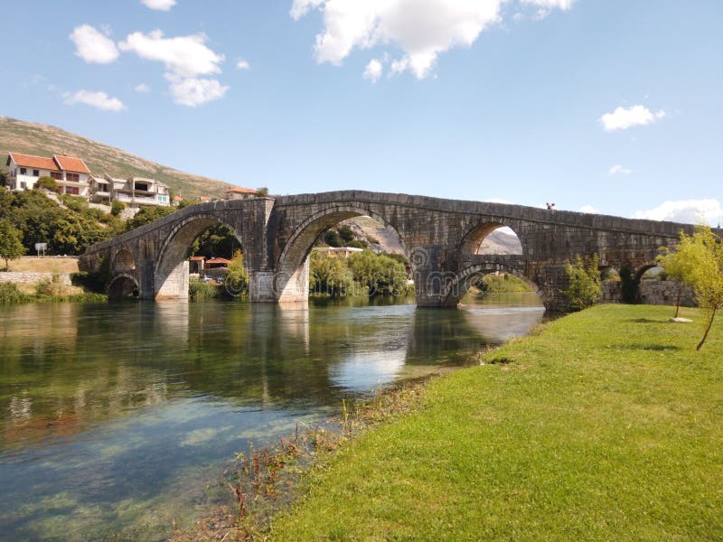 Arched Old Stone Bridge Over the River Stock Photo - Image of outdoors ...