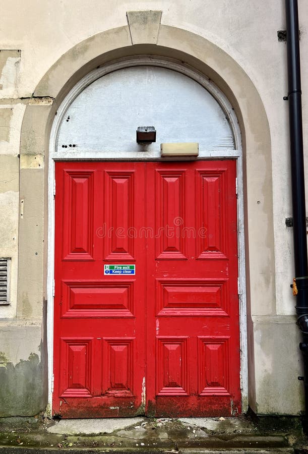 Arched Red Doorway stock image. Image of double, entrance - 307583893