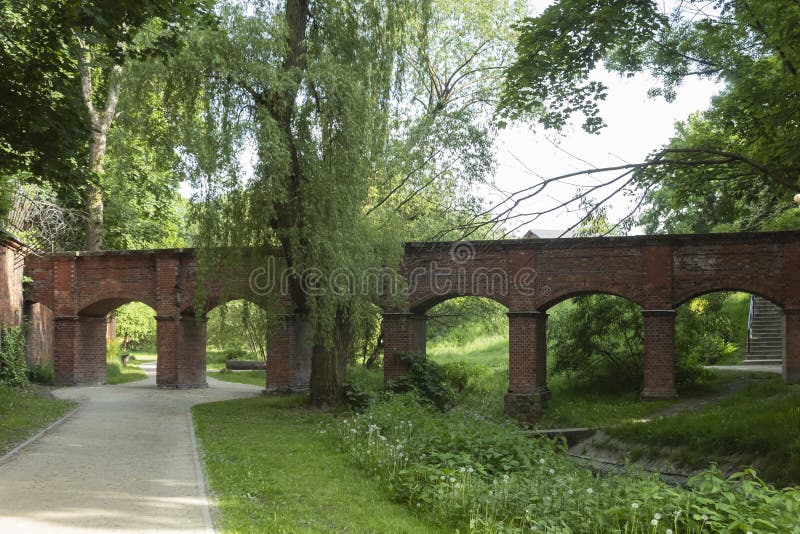An Arched Red Stone Bridge in an Old Castle Stock Image - Image of ...