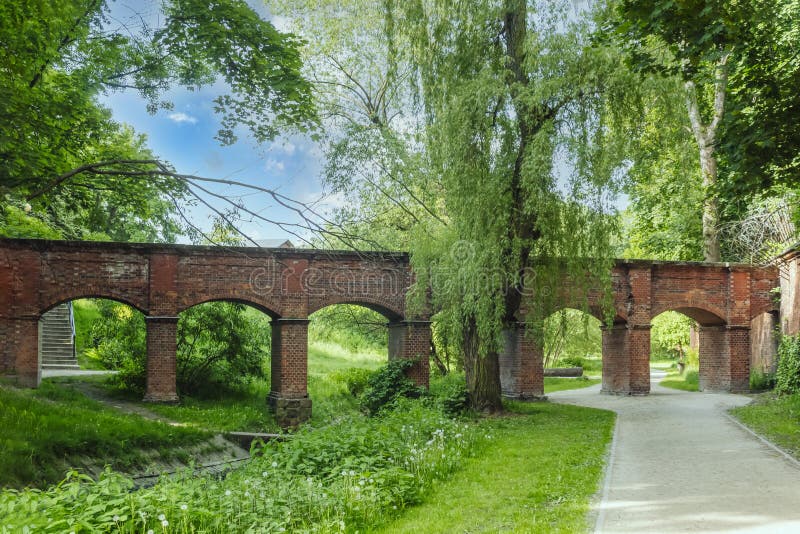 An Arched Red Stone Bridge in an Old Castle Stock Photo - Image of arch ...