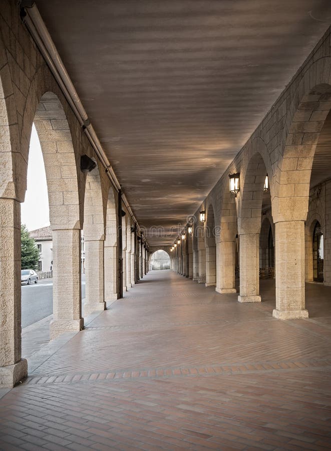 The arched stone colonnade stock image. Image of ancient - 174640655