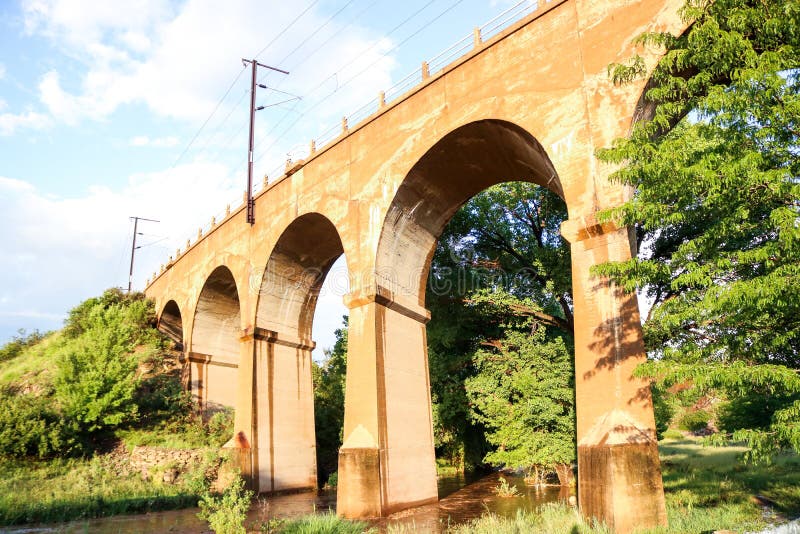 Arched Train Bridge Trees stock photo. Image of arches - 174879266