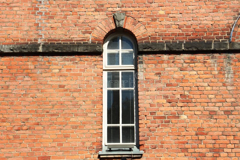 Arched brick house windows stock photo. Image of loft - 115907346