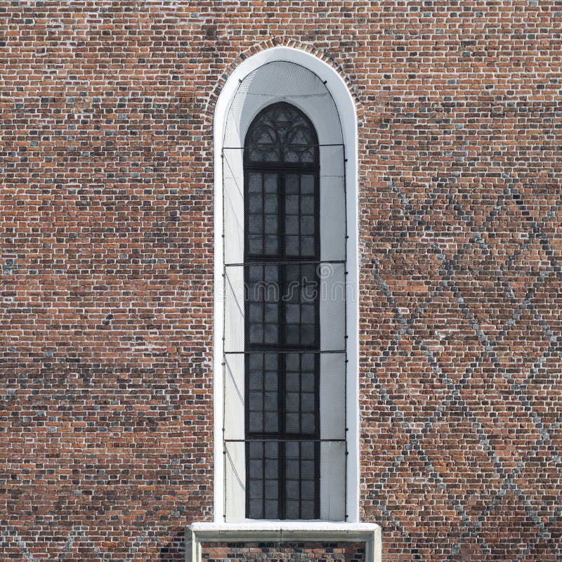 Arched window with bars editorial image. Image of exterior - 86265555