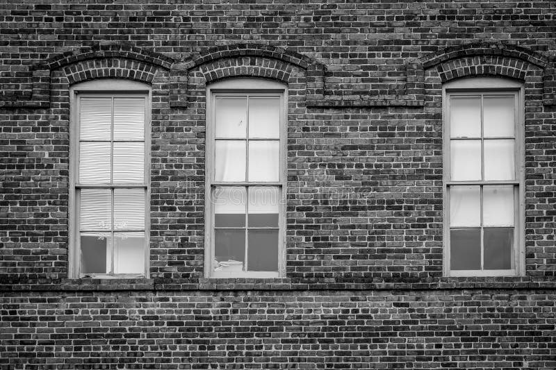 Arched Windows and Brick Wall in Black and White Stock Photo - Image of ...