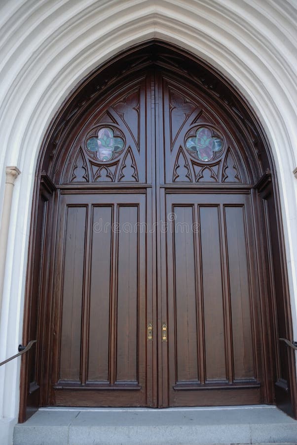 Arched wooden church door stock photo. Image of shut - 15289970