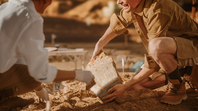 Archeological Digging Site: Two Great Archeologists Work on Excavation ...