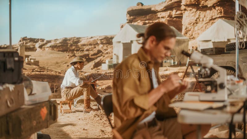 Archeological Digging Site: Two Great Archeologists Work on Excavation ...