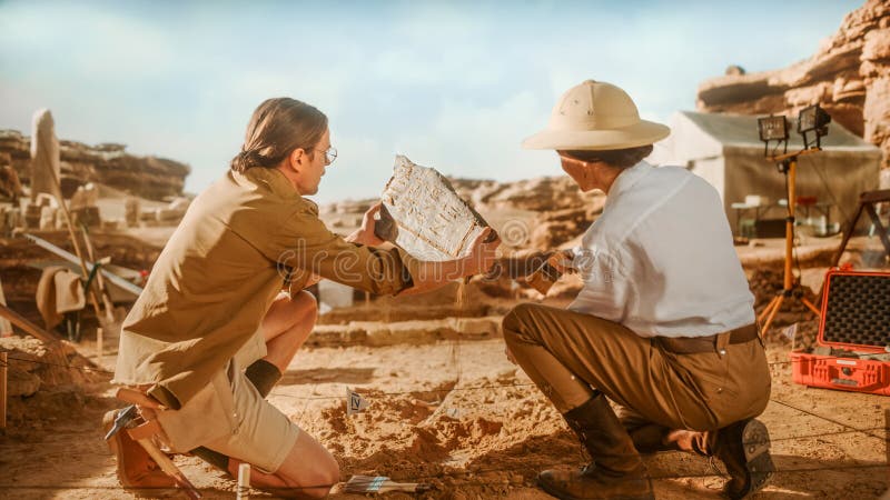 Archeological Digging Site: Two Great Archeologists Work on Excavation ...