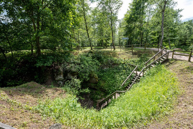 Archeological Pit Cave in the Ground in Meadow Stock Image - Image of ...