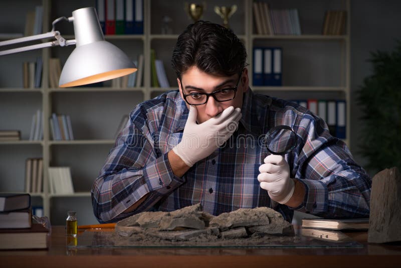 The Archeologist Working Late Night in Office Stock Image - Image of ...