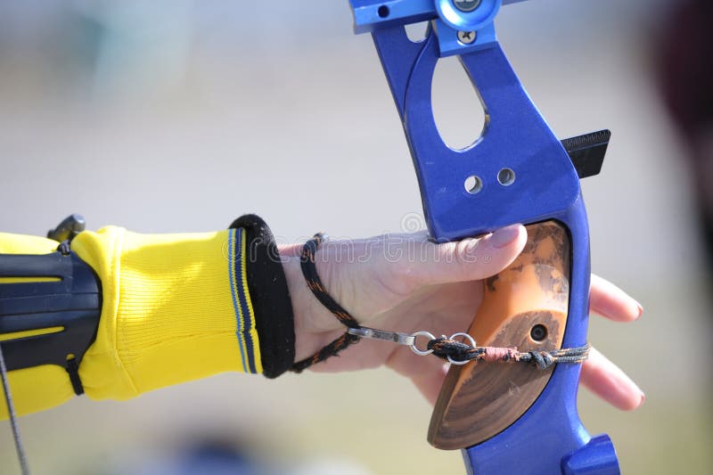 An Archer Hand Pulling the String Back of Bow Stock Photo - Image of ...