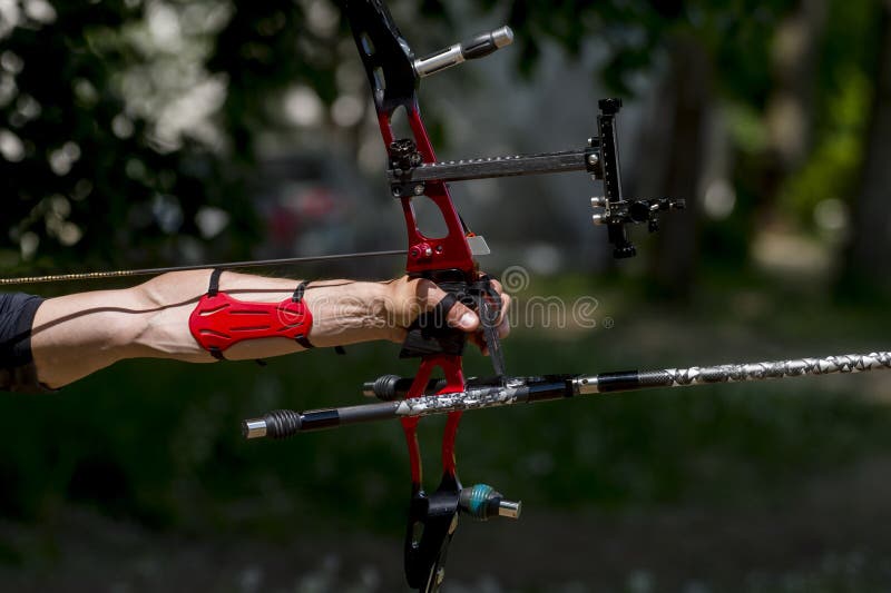 Archer Pulls on the Sport Bow String, Taking Aim at His Target at the ...