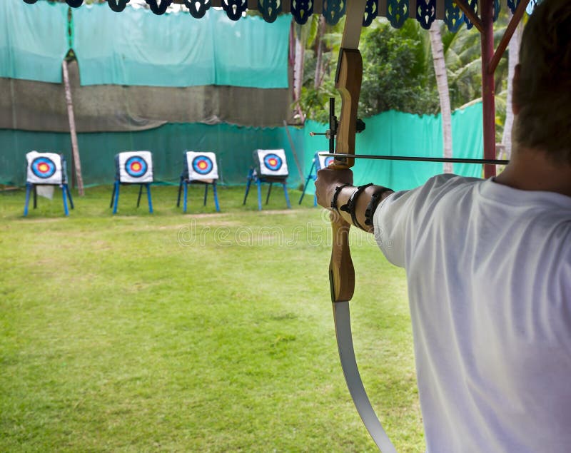 Archer Takes Aim at a Target Stock Image - Image of arrow, impact: 35678875