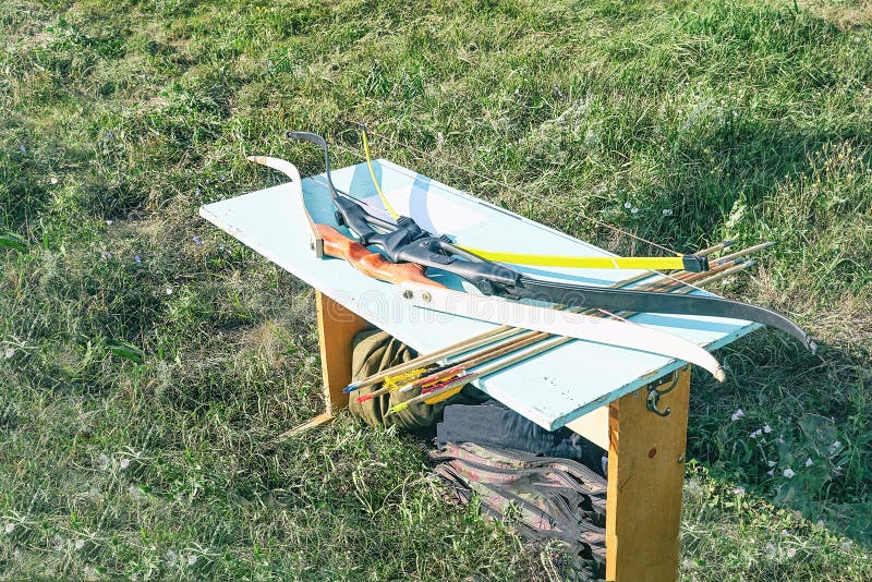 Archery and Arrows on the Table Stock Photo - Image of nock, longbow ...