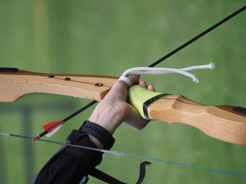 Archery with a Bow and Arrow in the Hands of a Man Stock Image - Image ...