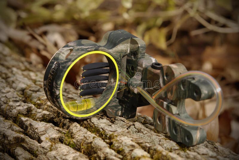 Archery Bow Sight Laying on a Wooden Surface Editorial Photography ...