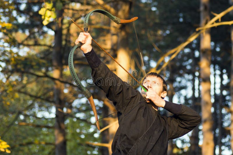 Archery in forest stock image. Image of male, archery - 87466255
