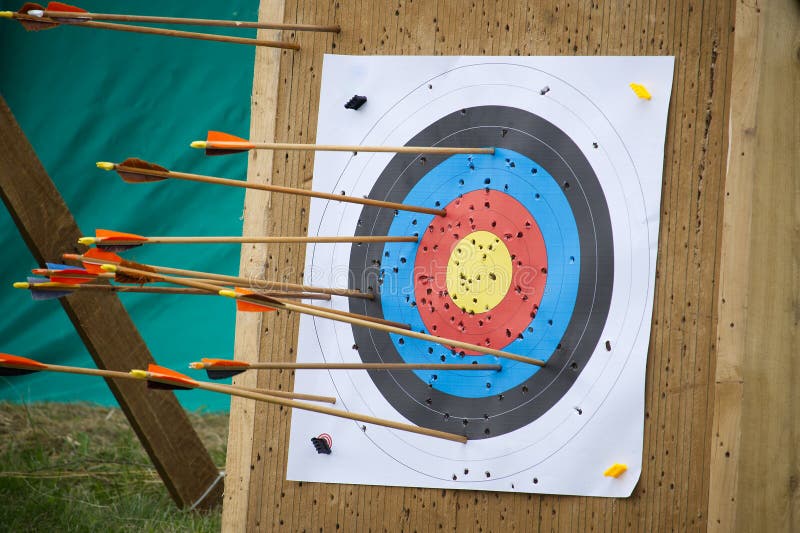 Archery Target Pierced by Arrows Stock Photo - Image of aiming ...