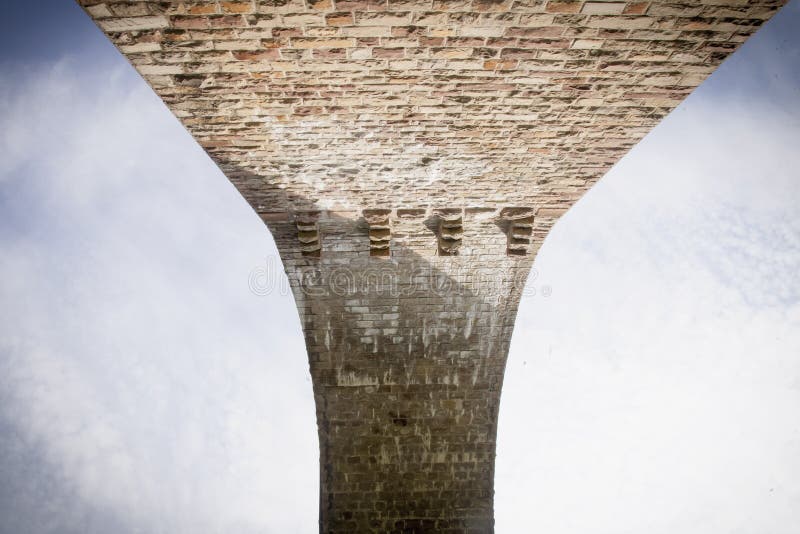 Arches of Ancient Stone Bridge. the Antique Romanesque Aqueduct Stock ...