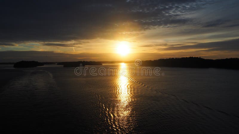 Archipelago sea at sunset stock photo. Image of archipelago - 126121626