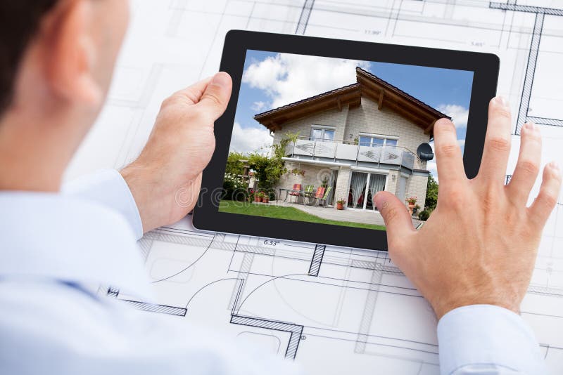 House and digital tablet stock photo. Image of house - 27041250