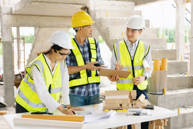 Architect Asian Team Working with Colleagues in the Construction Site ...