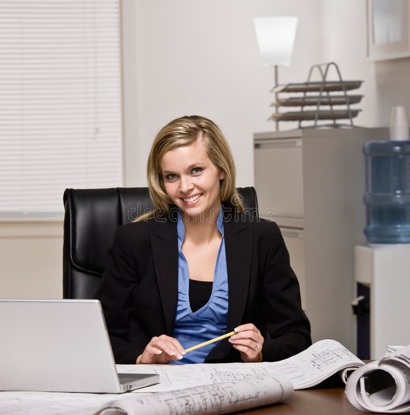 Architect with Blueprints at Desk Stock Image - Image of office ...