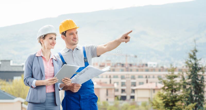 Architect and Builder Developing Ideas for Construction Project Stock ...