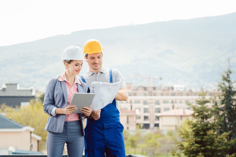 Architect and Builder Developing Ideas for Construction Project Stock ...