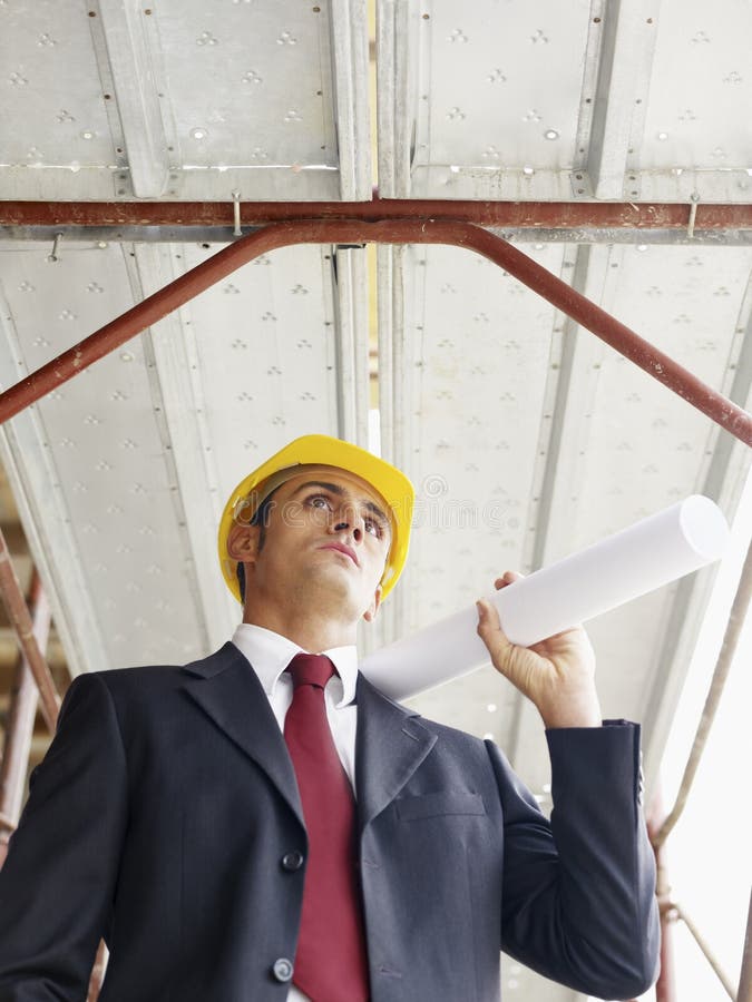 Architect with Building Plans Stock Image - Image of occupation, career ...