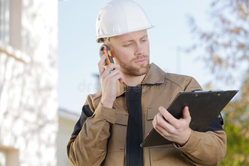 Architect on Building Site Using Mobile Phone Stock Photo - Image of ... Architect on Building Site Using Mobile Phone Stock Photo - Image of ...