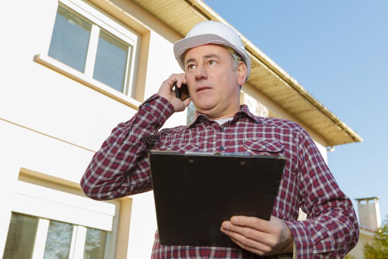 Architect on Building Site Using Mobile Phone Stock Image - Image of ... Architect on Building Site Using Mobile Phone Stock Image - Image of ...